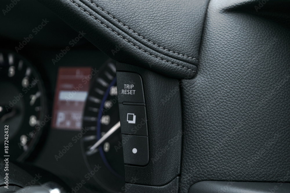 Car instrument panel, dashboard closeup with visible speedometer and ...