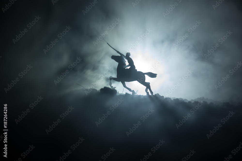 World war officer (or warrior) rider on horse with a sword ready to ...