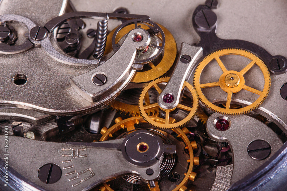 Open clock mechanism with gears and a spring Stock Photo | Adobe Stock