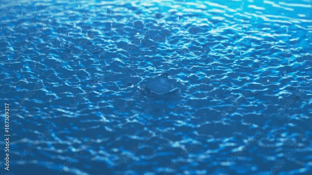 Rain Hits Blue Water Surface In Slow Motion - Raindrops hitting Water ...