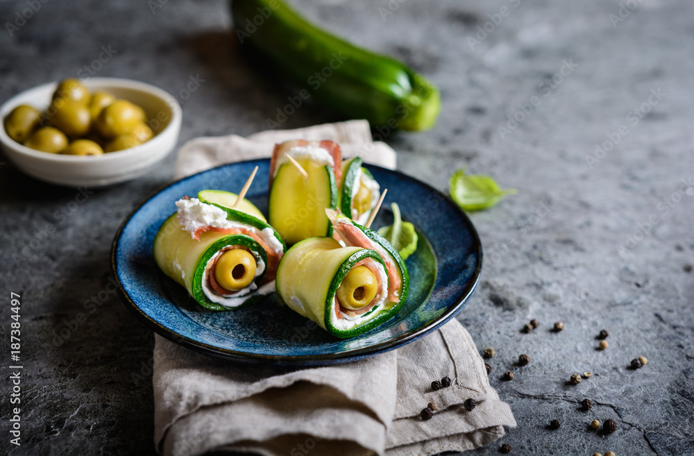 Rolled zucchini slices stuffed with bacon, cream cheese and olive Stock ...