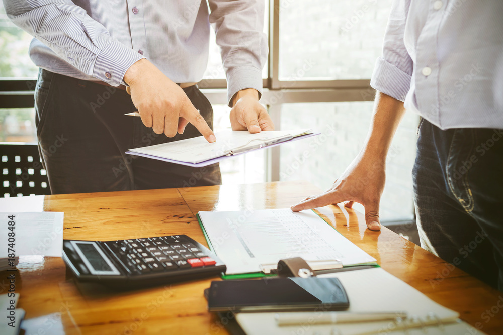 Teamwork business officer working hard investing financial reports and ...