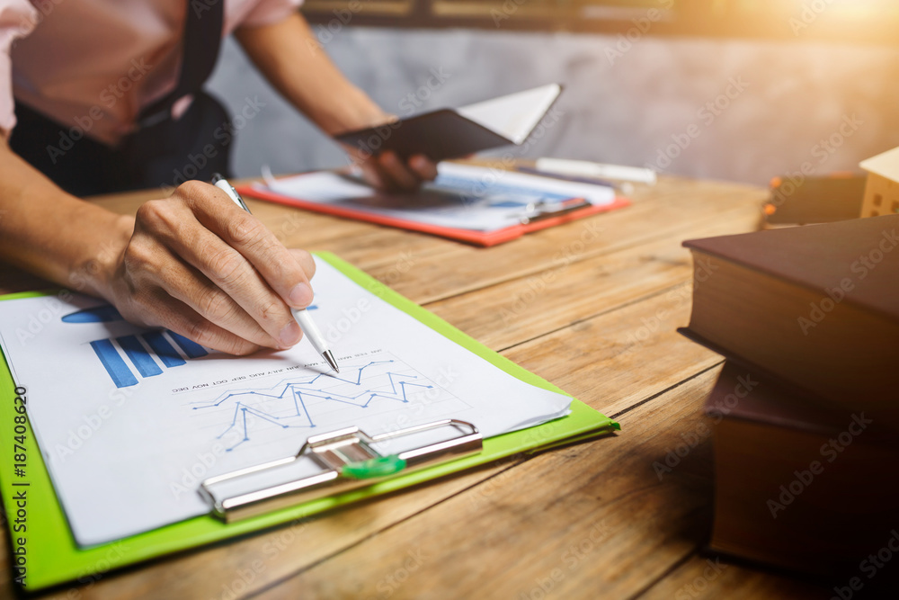 Financial businessman hands working hard tax audit service calculating ...