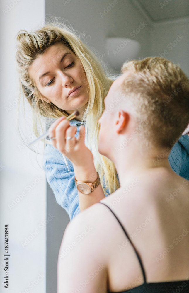 Female friend helps a man transform into a woman in boy to girl ...