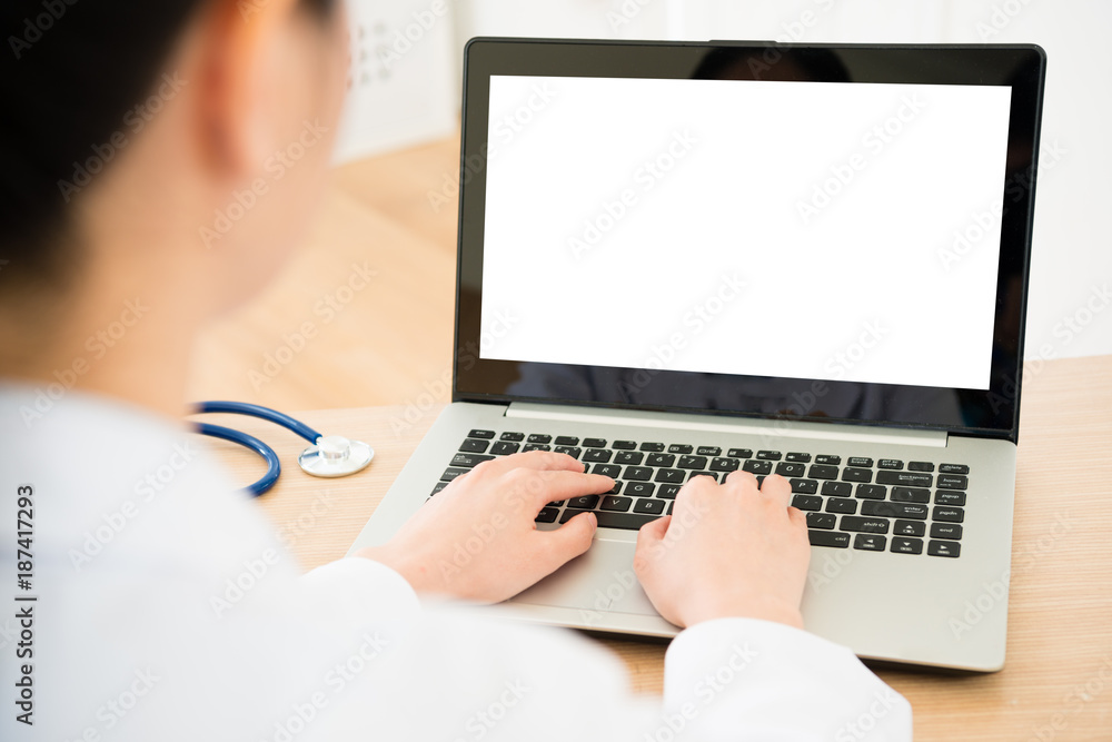 back view of female doctor using mobile computer Stock Photo | Adobe Stock