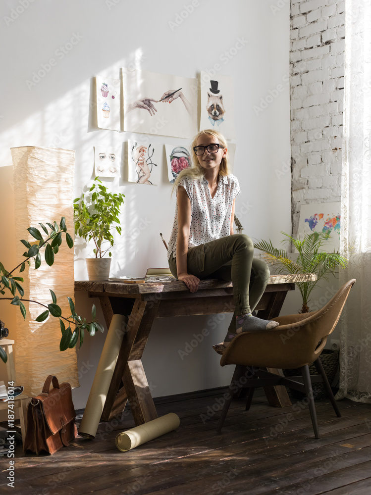Pretty girl on the desk Stock Photo | Adobe Stock