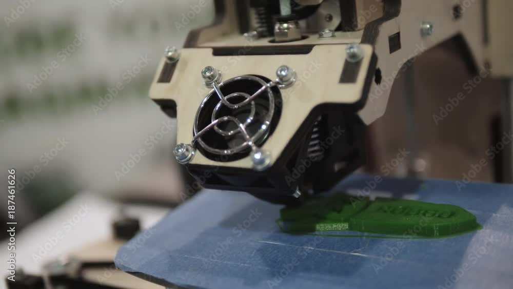 Close up.Automatic three dimensional 3d printer performs product ...