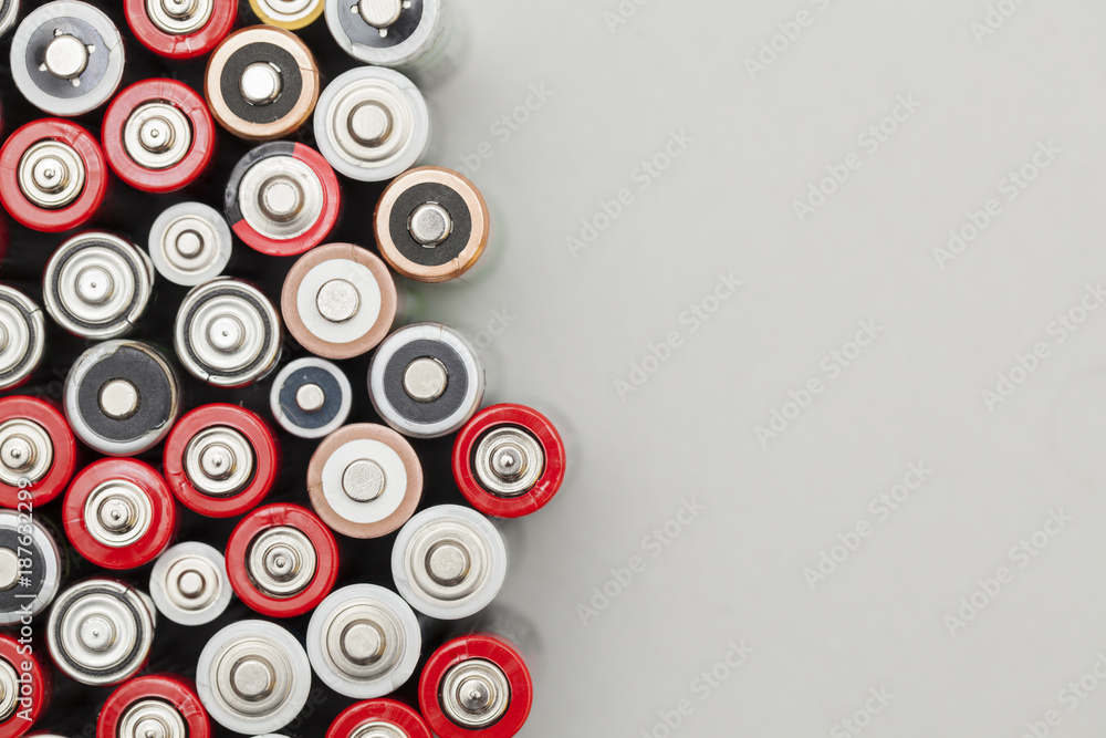 Batteries background. Energy supply and recycling concept Stock Photo ...