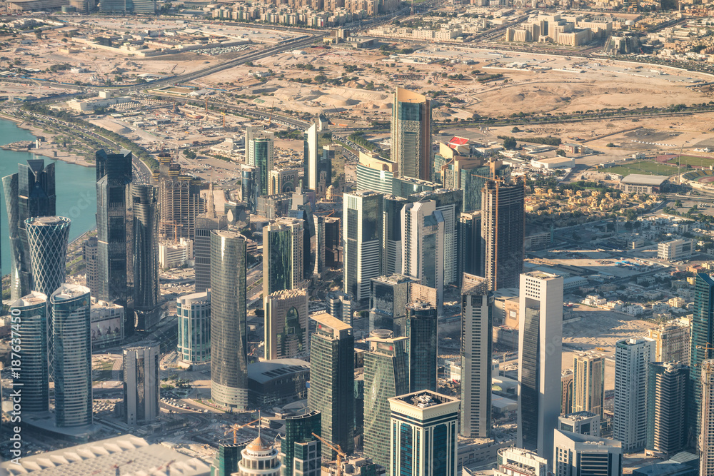 Foto de Doha aerial skyline from the airplane. Doha is a major hub for ...