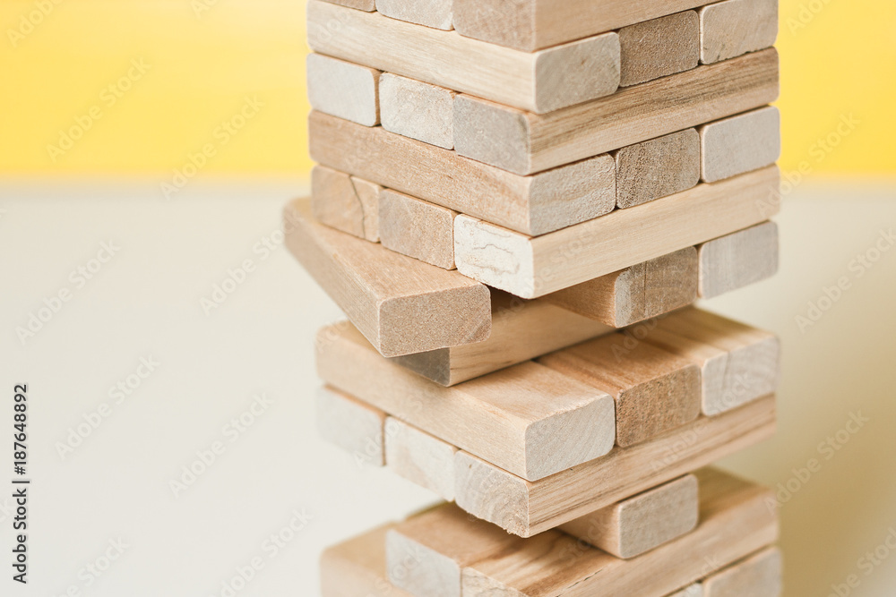 Board game falling tower of wooden blocks Stock Photo | Adobe Stock