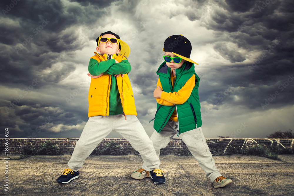 Two brothers dancing break dance.Hip-hop style.The cool kids. Stock ...