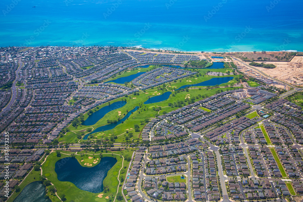 Aerial view of the Honolulu district near the airport with private ...