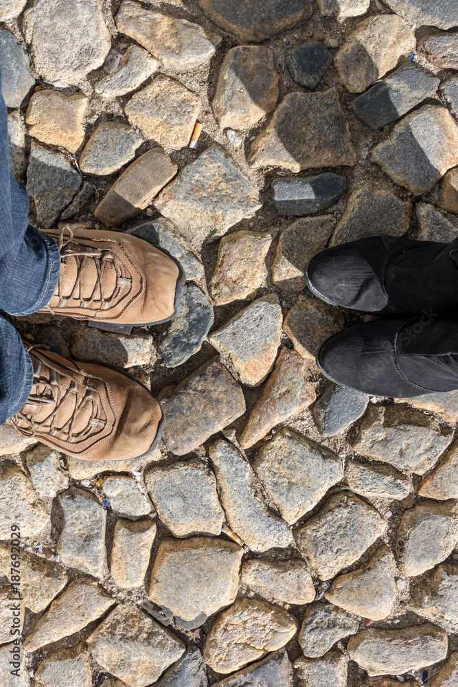 Perspective of a people looking at their shoes, appropriate for hiking ...