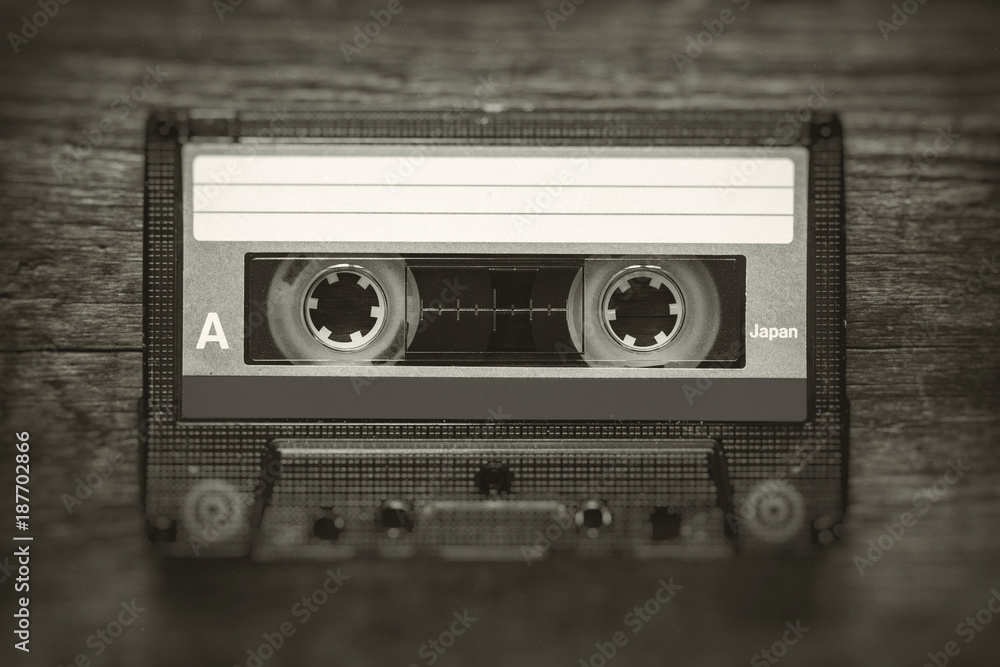 Poster Retro stylized photo of vintage Audio cassette tape with blur ...