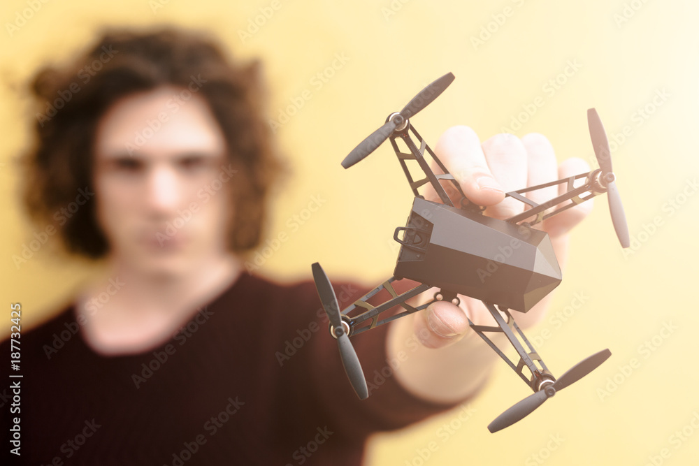 Man with a drone Stock Photo | Adobe Stock