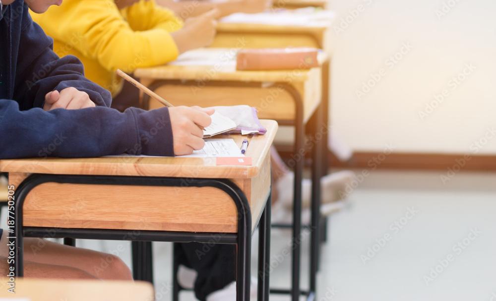 students writing test exam on paper for Admissions in high school with ...