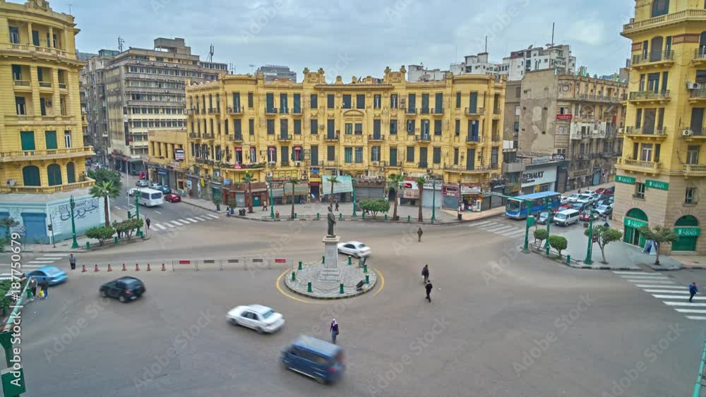 The fast traffic in Talaat Harb square - historic location in downtown ...