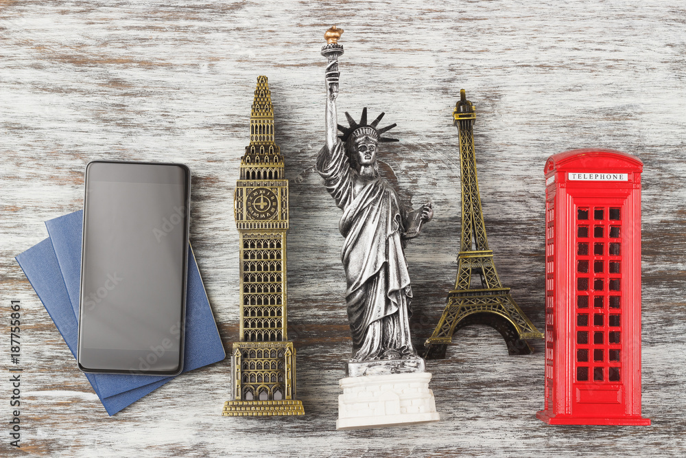 Travel and tourism background with souvenirs from around the world. Top ...