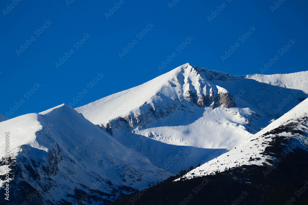 Mountain snow peak, beautiful natural winter backdrop. Ice top of the ...