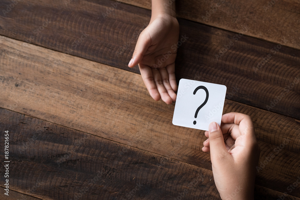 hand giving a note written question mark. asking question concept Stock ...