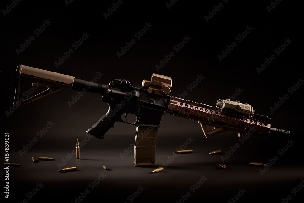 military wallpaper with an assault rifle on a black background Stock ...