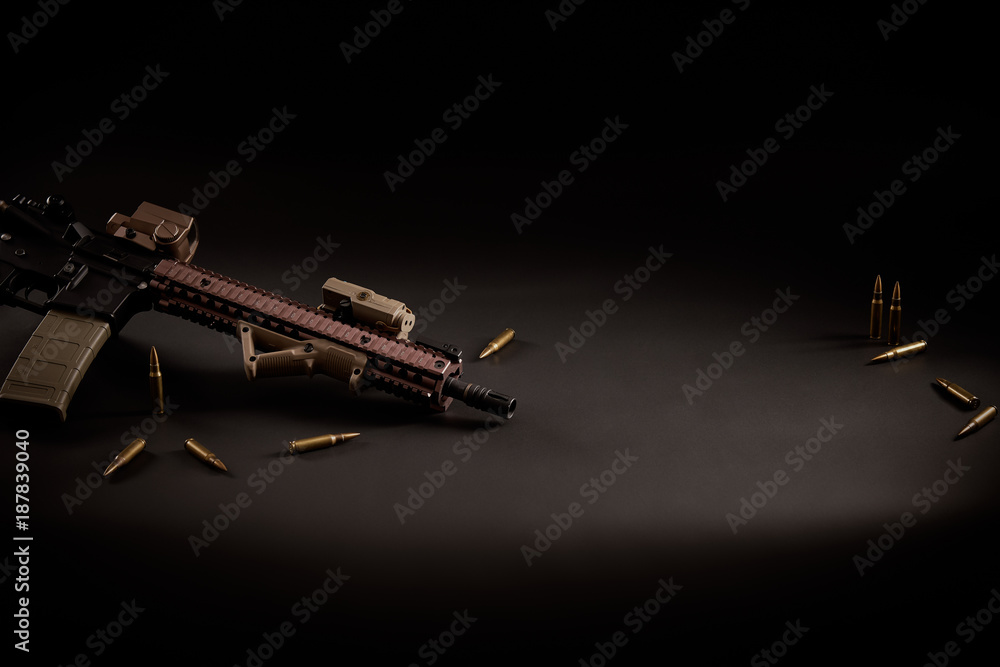 military wallpaper with an assault rifle on a black background Stock ...