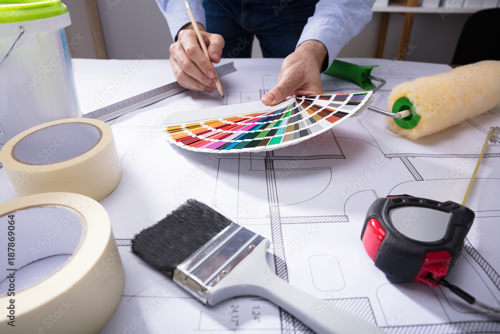 Architect Using Color Guide Swatch While Drawing Blueprint Stock Photo ...