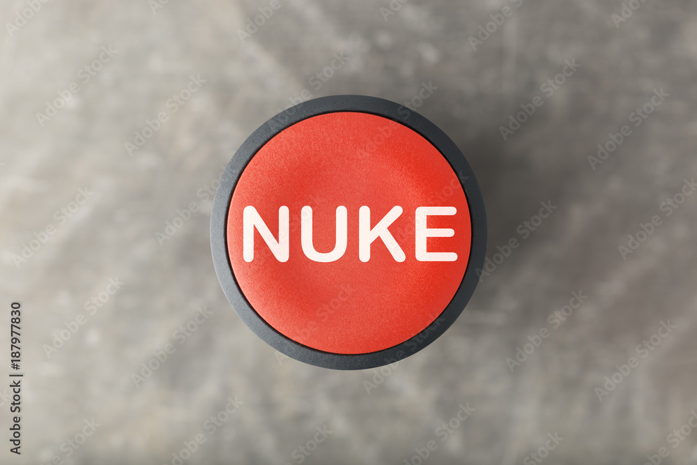 Overhead of Red Nuke Push Button Over Blurred Gray Background Stock ...