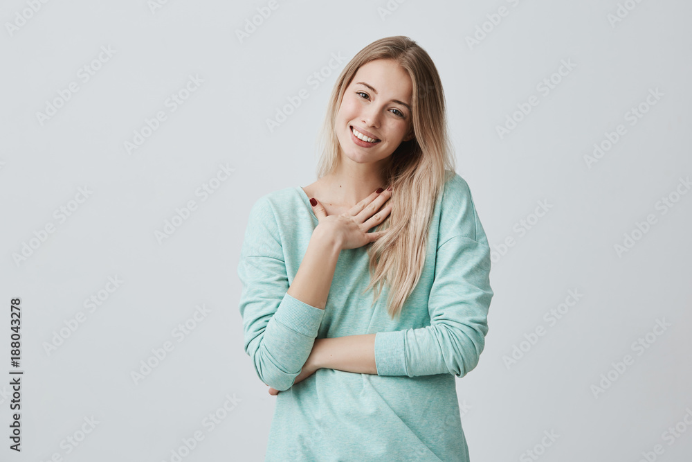 Happy blonde woman glad to recieve present from husband has joyful ...