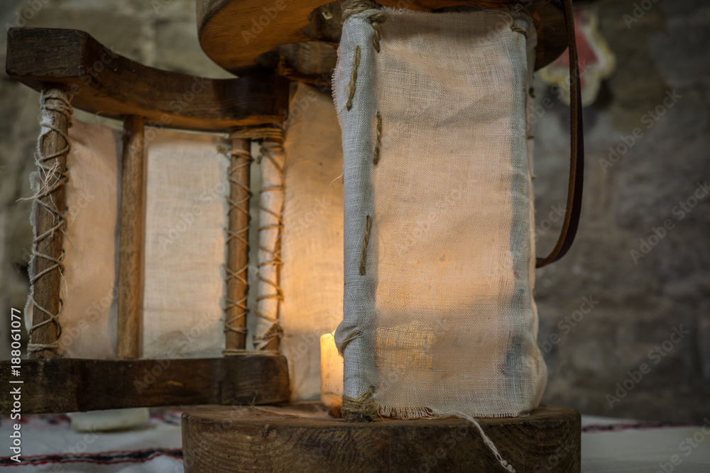 medieval Wooden lantern on a medieval settlement reenactment with ...