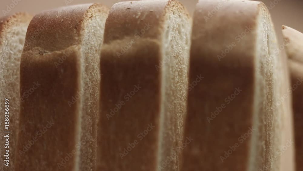 round movement of slices of bread showing the bread texture closeup ...