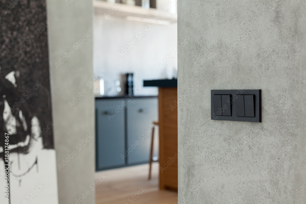 Switch and socket in the kitchen background Stock Photo | Adobe Stock