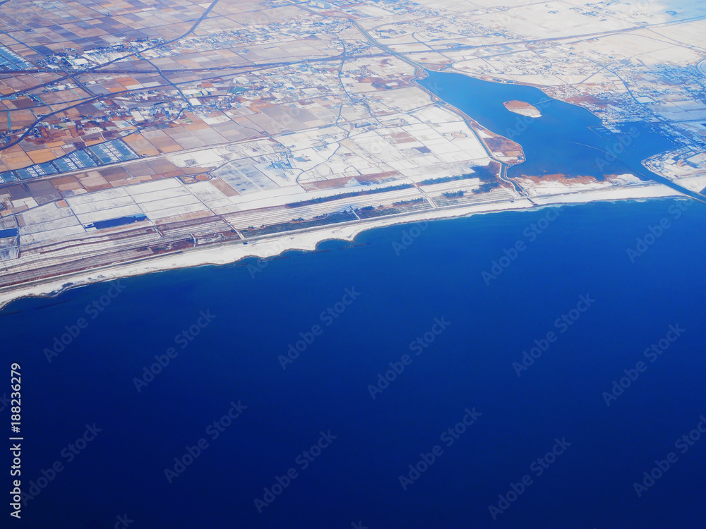 Japan Sendai bay, city, seashore, and port in winter, covering with ...
