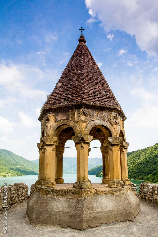 Tower against the sky and clouds. Fortress Ananuri, Daryal Gorge ...