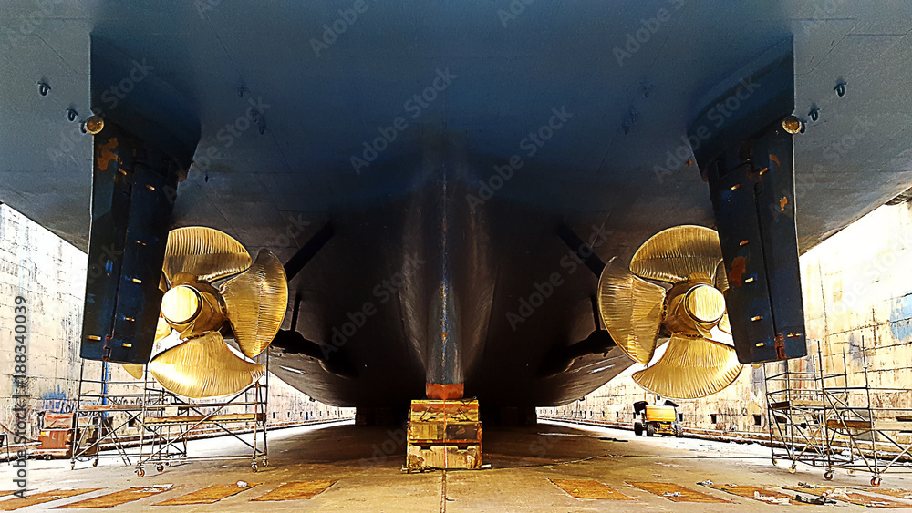 black ship hull and golden propeller at drydock Stock Photo | Adobe Stock