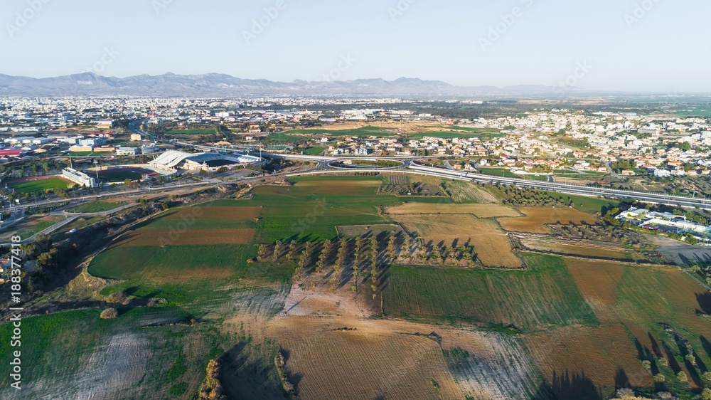 Aerial bird's eye view of GSP football stadium, highway A1 at Latsia ...