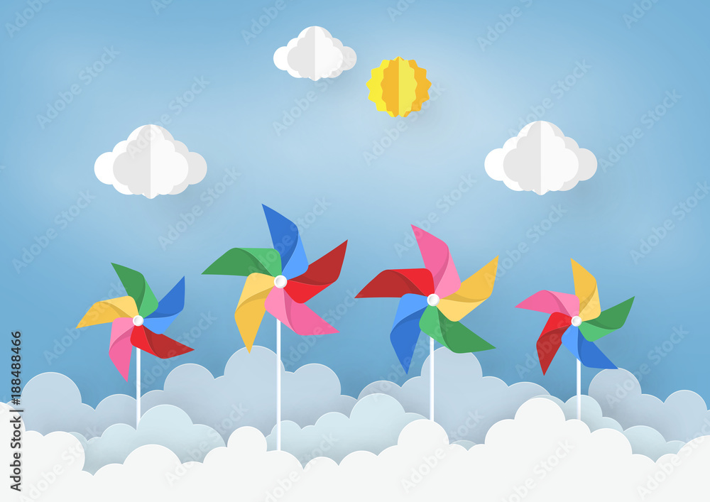 Paper Art Design with Cloud and pinwheel on light Blue background . the ...