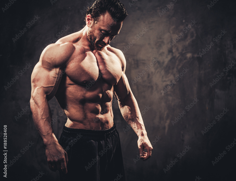 Man showing his muscular body Stock Photo | Adobe Stock