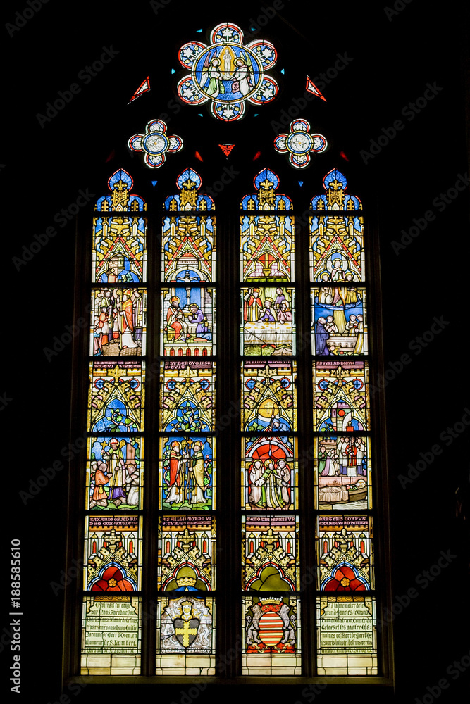 Stained glass window in medieval catholic church Stock Photo | Adobe Stock