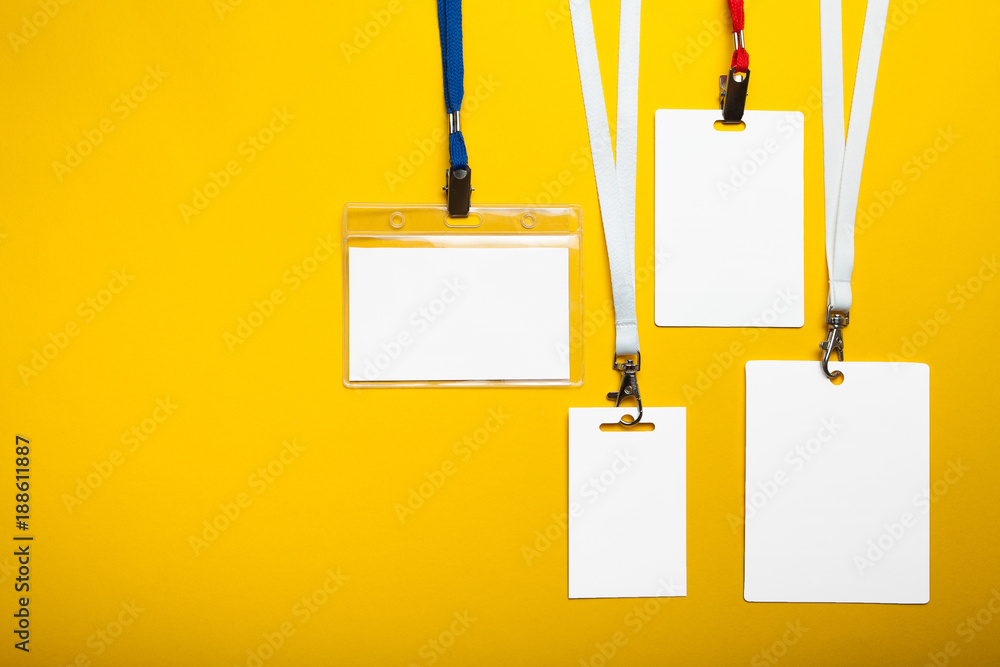 Set of card badges with ropes on yellow background. Mock-up. Stock ...