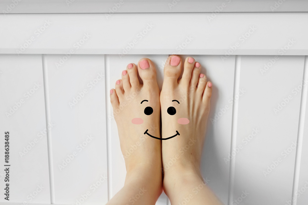 Smiley Face Barefoot with Pink Nail Polish Manicure. Beautiful Female ...