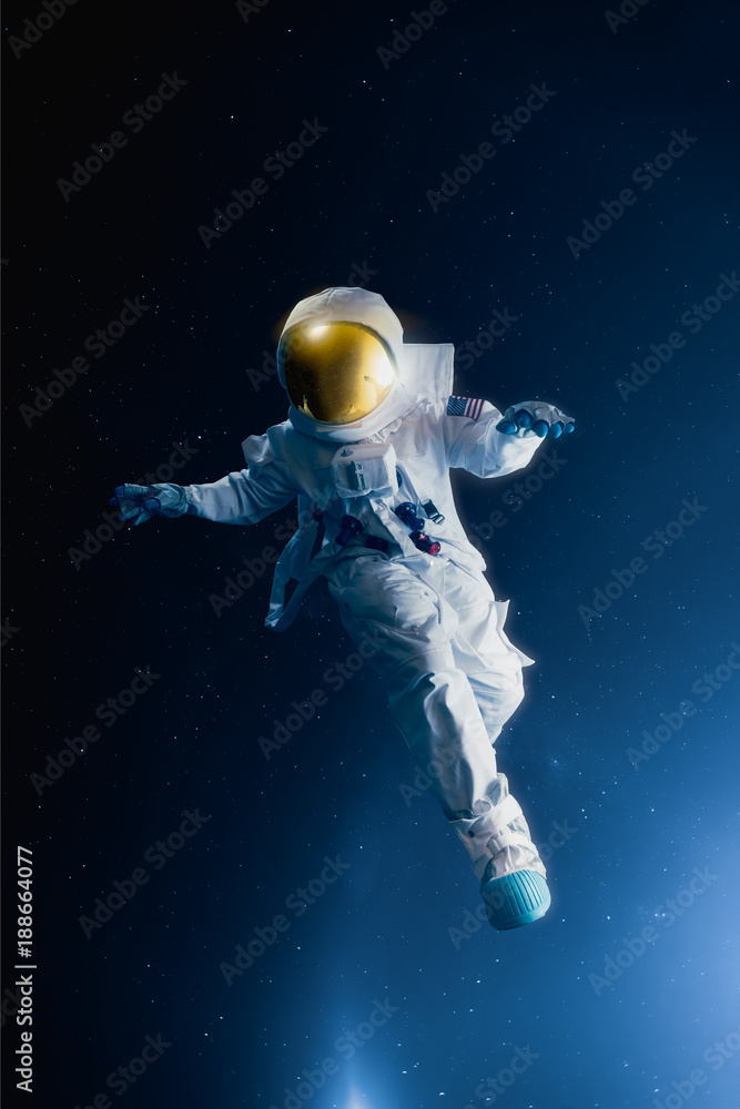 Astronaut floating in outer space , high contrast image Stock Photo ...