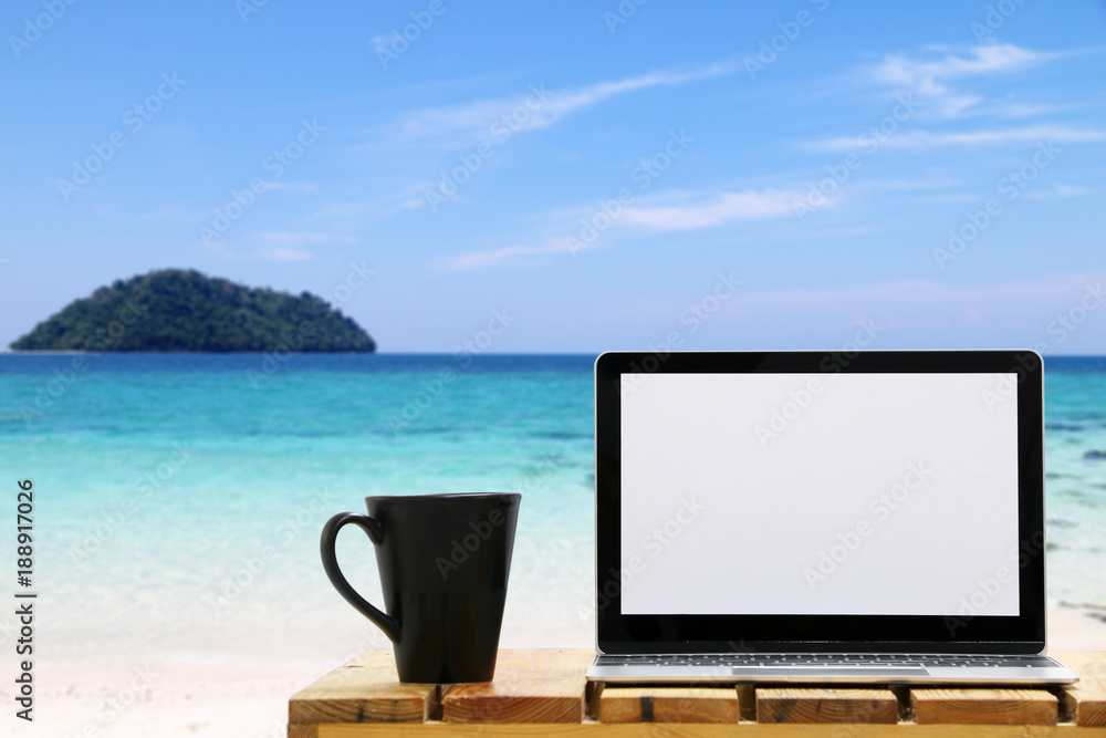 Workspace Laptops On the beach Stock Photo | Adobe Stock