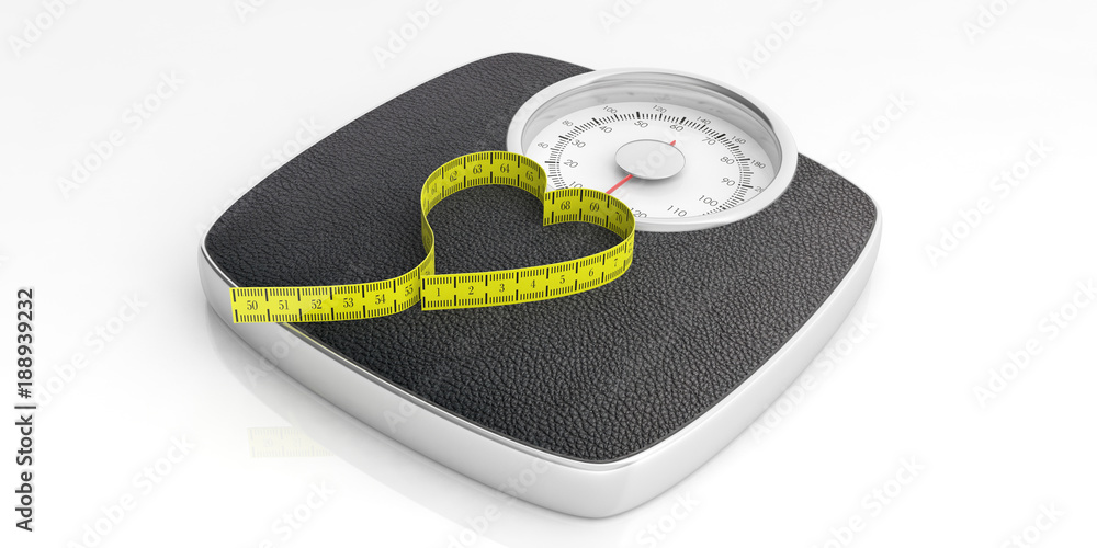 Weighing scale and a heart shape measure tape isolated on white ...