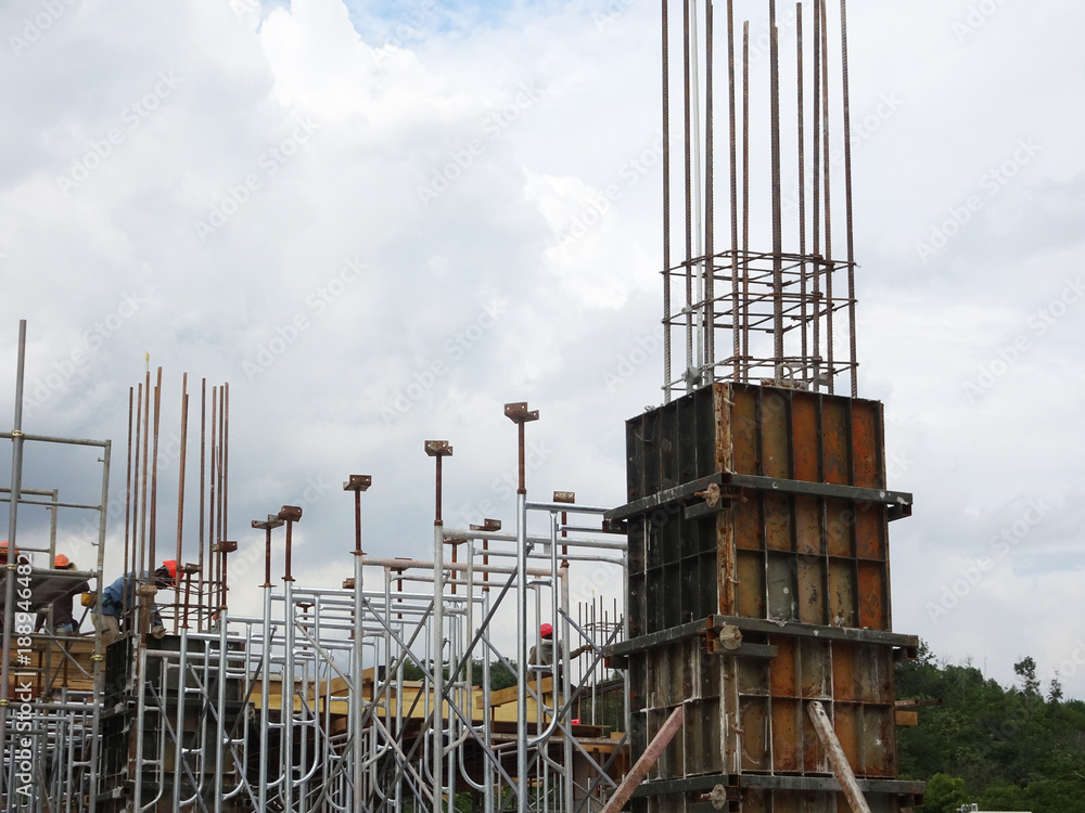 Construction workers fabricated steel reinforced concrete column at the ...