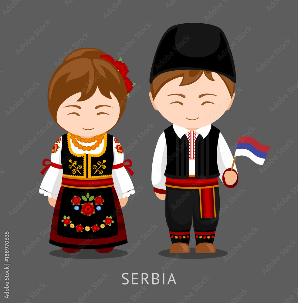 Serbs in national dress with a flag. Man and woman in traditional ...