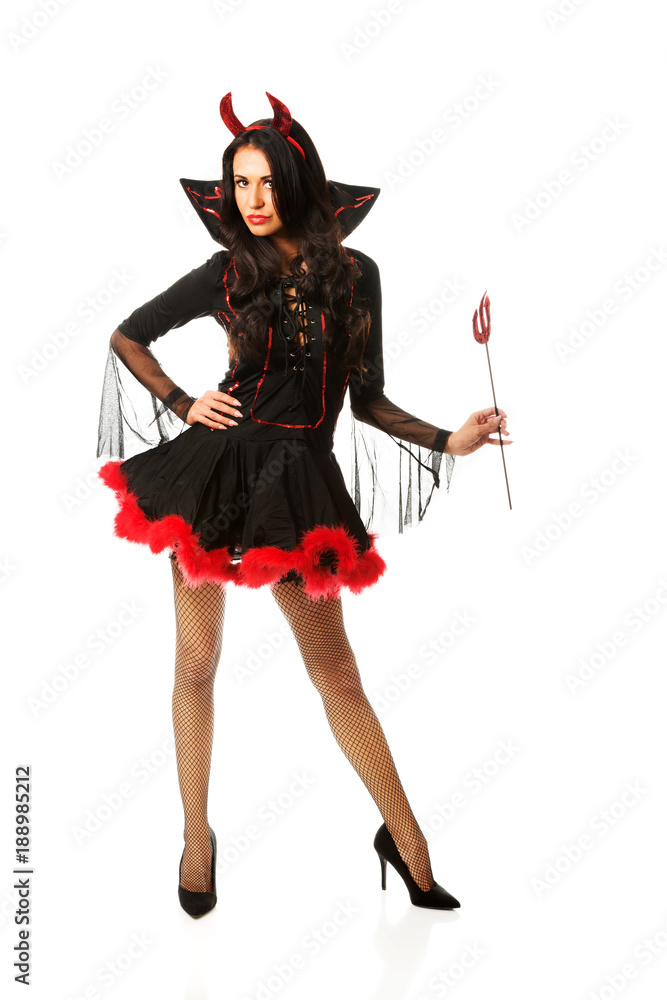 Woman wearing devil clothes holding trident Stock Photo | Adobe Stock