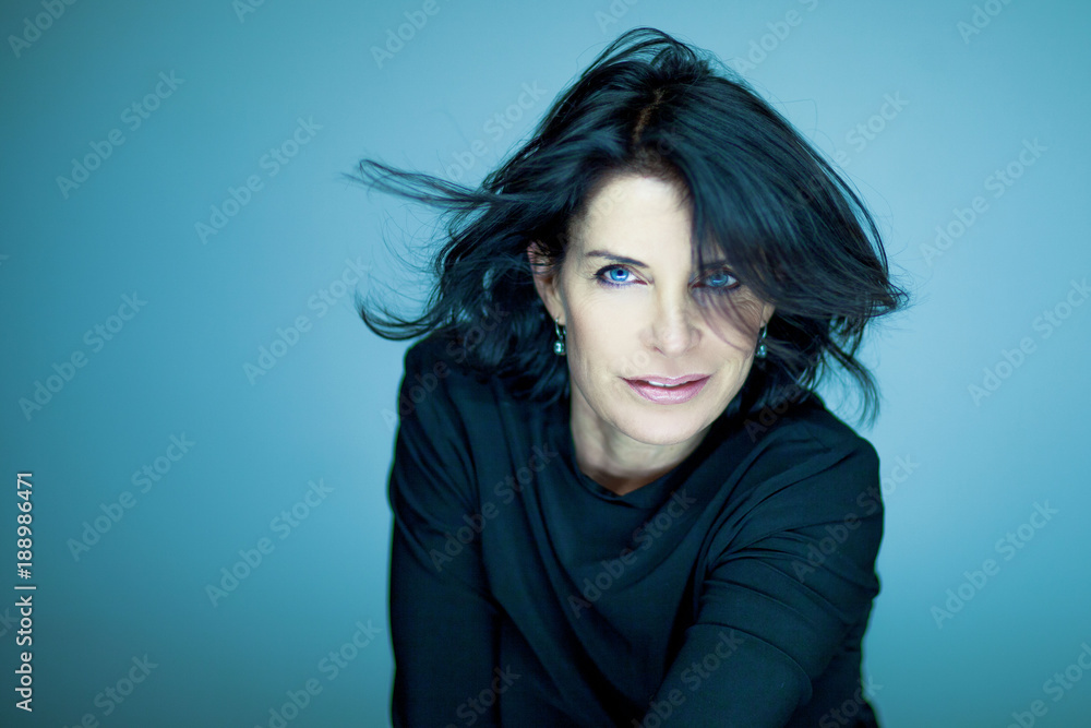 stunning beautiful and self confident middle aged woman with black hair ...