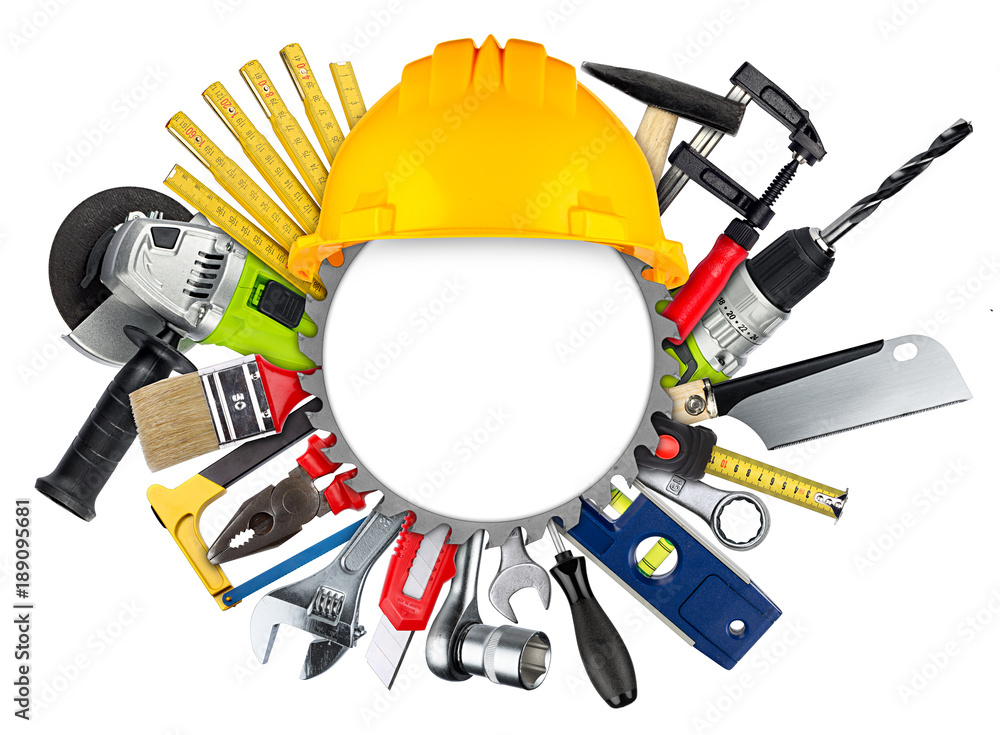 buzz saw blade with copy space building-site helmet and diy hand tools ...