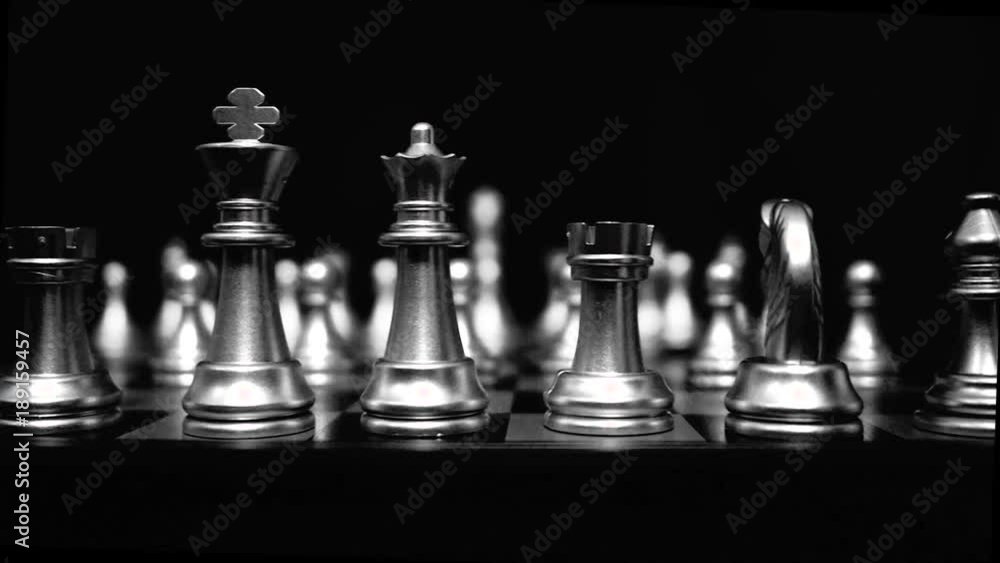 4K. chessboard and chess pieces dolly video slider with black and white ...
